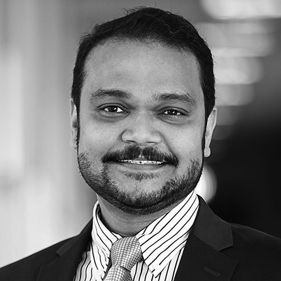 AI VISIONARY Ramnath K. Chellappa (left), associate dean and professor ...